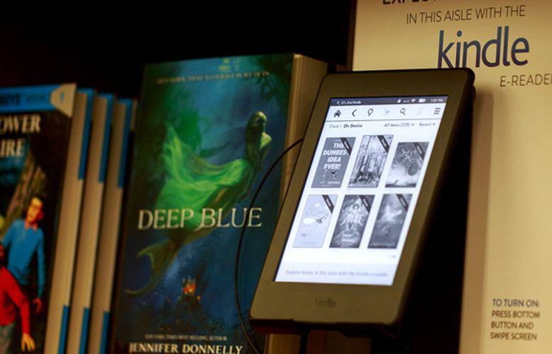 Amazon CEO Jeff Bezos hints at new, high-end Kindle | The Seattle Times