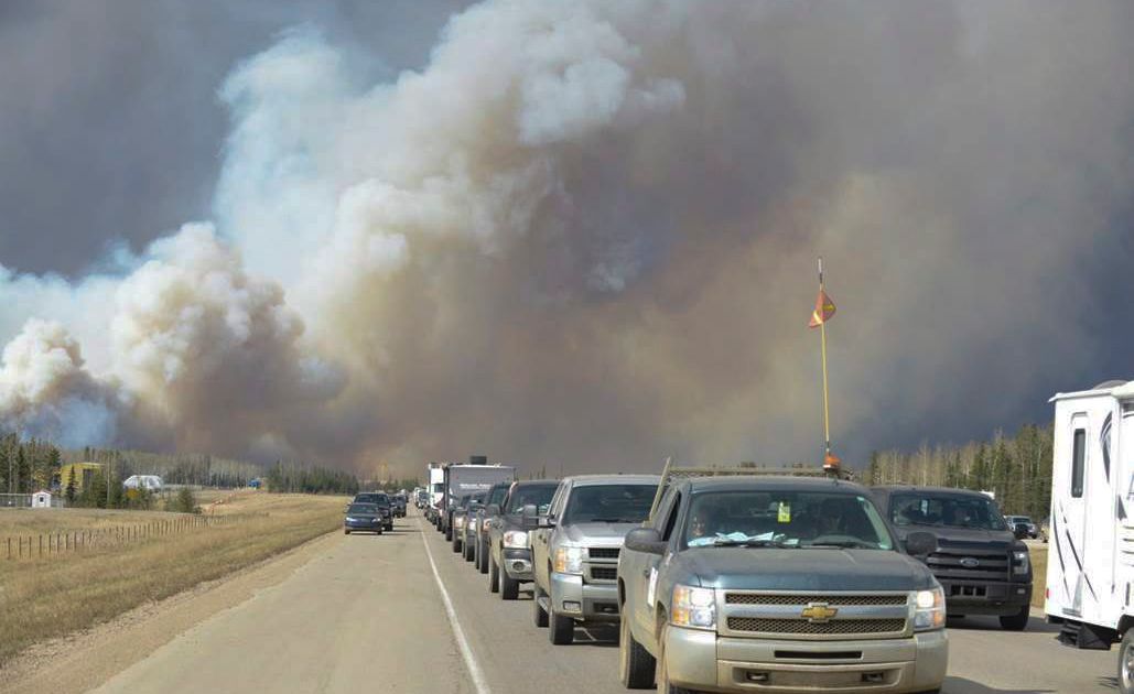 Alberta declares emergency as fires threaten Canada oil town | The ...