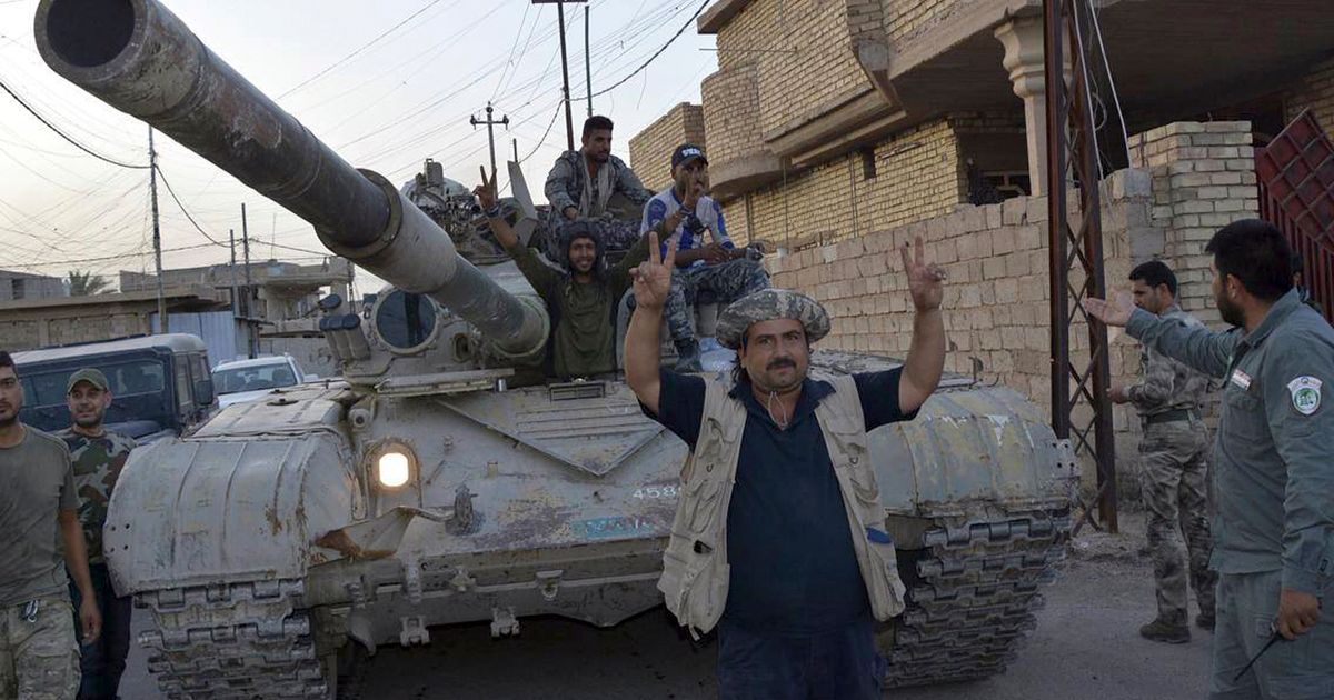 Iraqi troops seize Fallujah hospital, clear mines | The Seattle Times