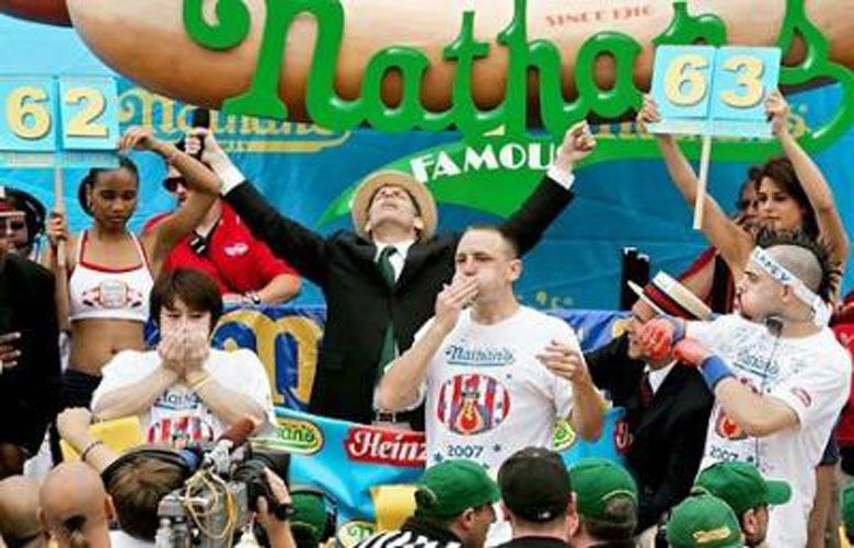 Behind famed hot dog contest, a whopper of a legend | The Seattle Times