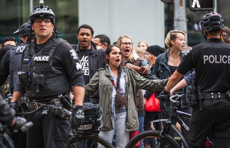 We must build trust between people and police | The Seattle Times