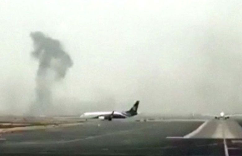 Emirates airliner with 300 onboard crash lands in Dubai | The Seattle Times
