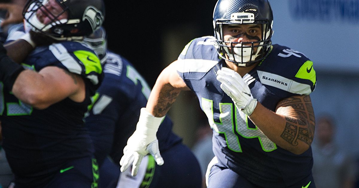 UW’s ‘carpool mom,’ Tani Tupou, makes NFL debut with the Seahawks | The ...