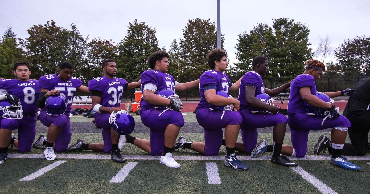 Garfield football team will continue to kneel during anthem, seeks ...