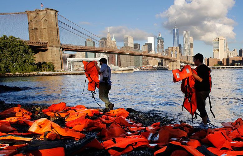 Life jackets placed at NY waterfront reflect refugee crisis | The ...