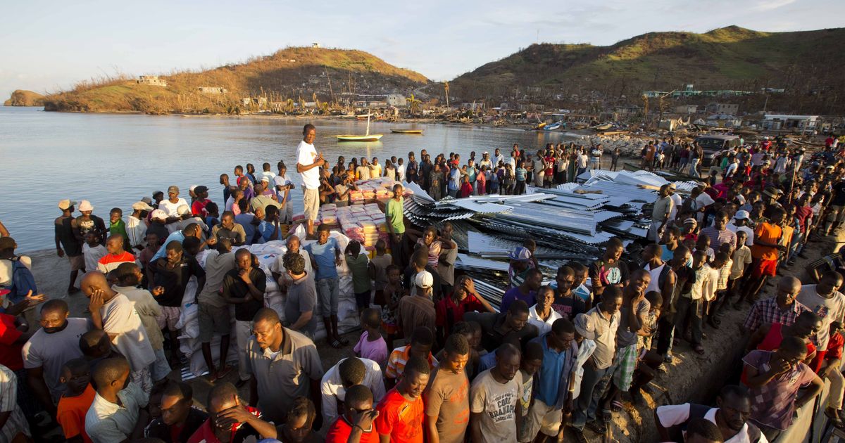 Haitians await aid, help each other regain some normalcy | The Seattle ...