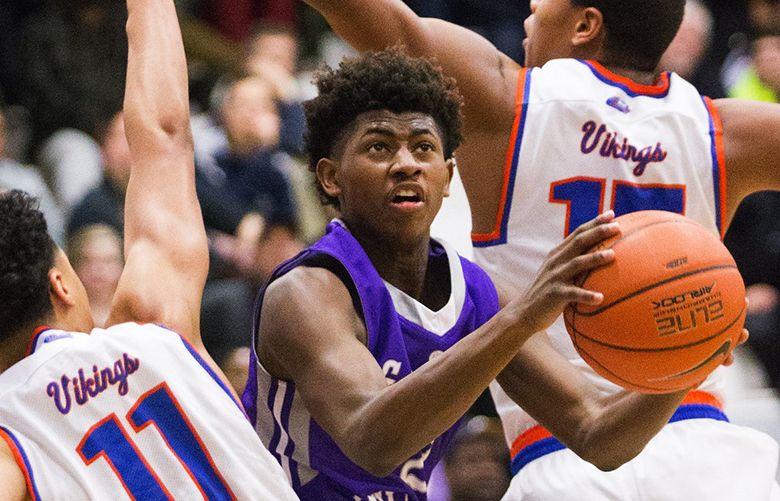 Garfield’s Daejon Davis commits again to Washington | The Seattle Times