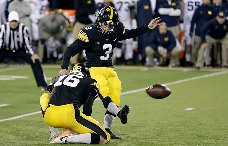Iowa knocks off 2nd-ranked Michigan 14-13 on field goal as time expires ...