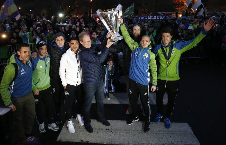 Sounders fans welcome MLS Cup champs back from Toronto | The Seattle Times