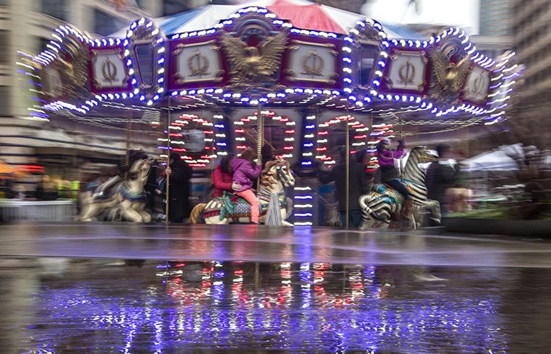 Carousel is a holiday tradition, rain or shine | The Seattle Times