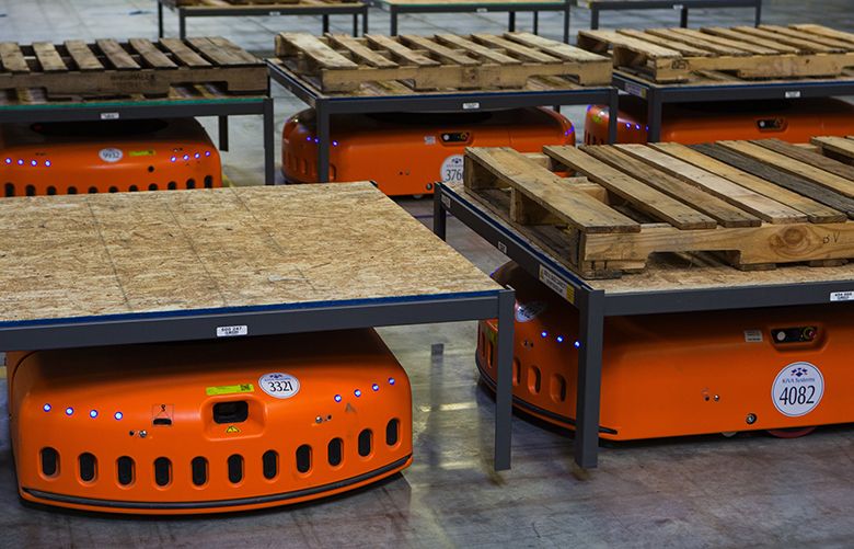 Amazon deploys many more orange robots at warehouses | The Seattle Times