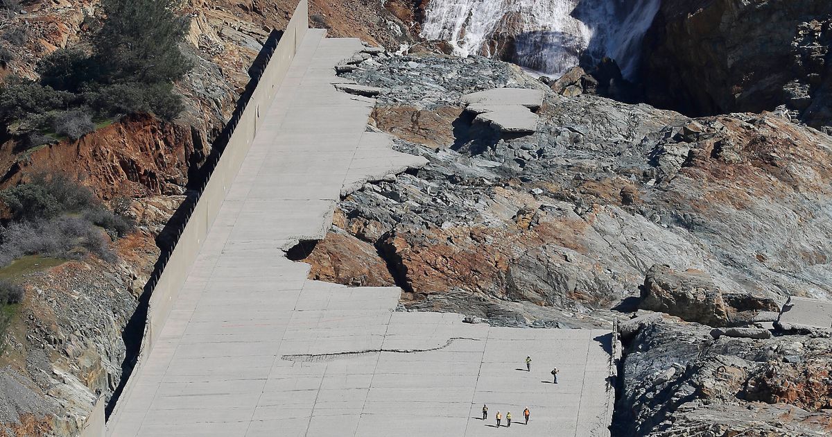Massive debris pile emerges from water near troubled dam | The Seattle ...
