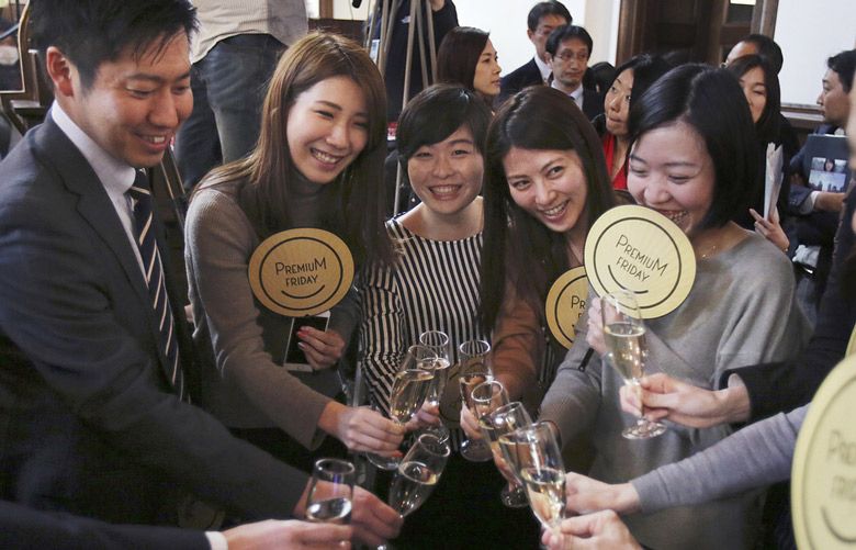Japan starts weekend early to improve work-life balance | The Seattle Times