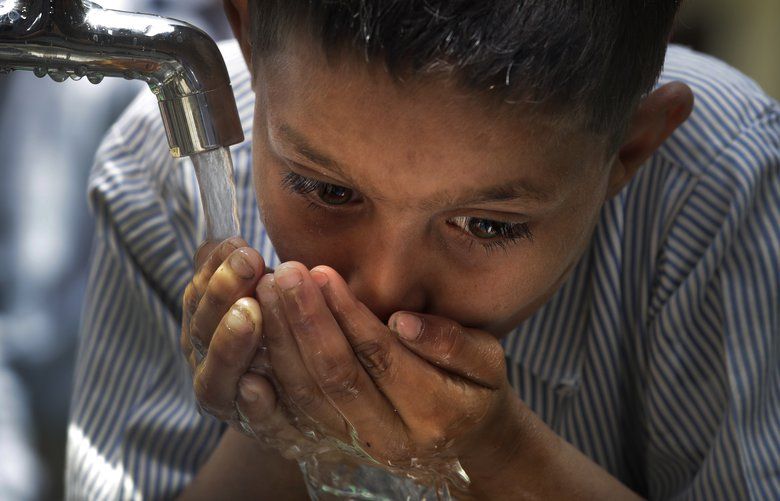 Clean-water plant brings hope to village in north India | The Seattle Times