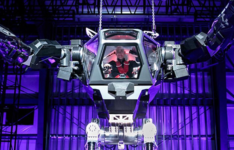 The suit makes the man: Amazon CEO Jeff Bezos dons robotic armor | The ...