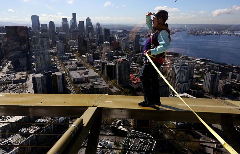 Fundraising event lets winners walk Space Needle ‘halo’ | The Seattle Times
