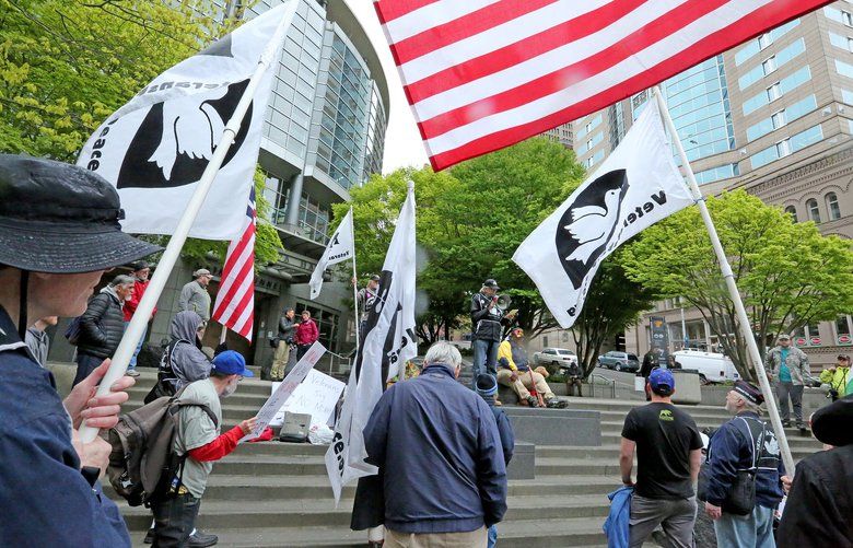 Katherine Long, Christine Clarridge | The Seattle Times