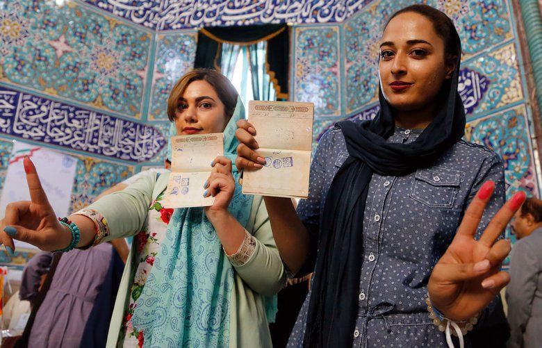 Iranians turn out in large numbers for closely watched vote | The ...