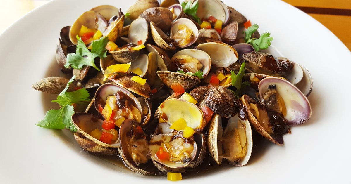 Executive Chef Pat Donahue of Anthony’s digs into an enticing Manila ...