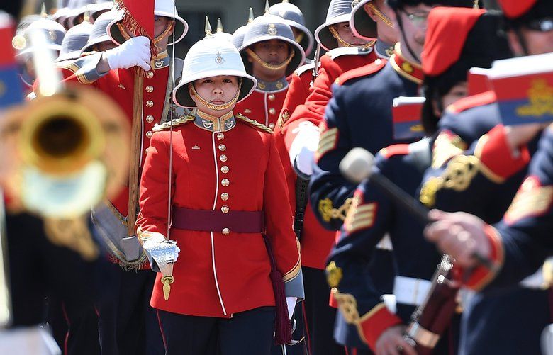 Woman leads UK Changing of the Guard ceremony | The Seattle Times