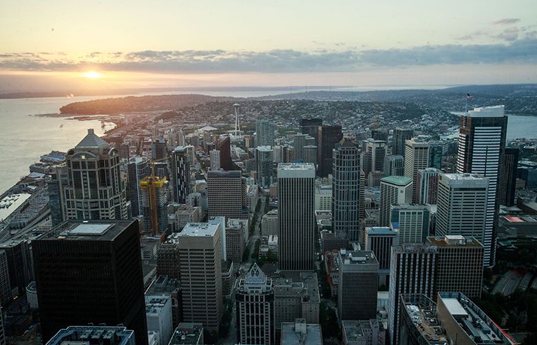 Seattle added more people last year than all of King County’s suburbs ...