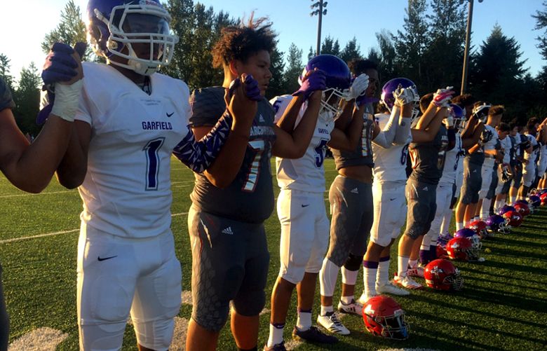 Archbishop Murphy, Garfield open football season with show of unity ...