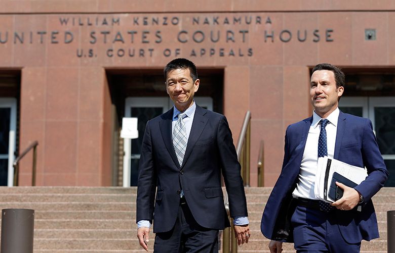 Government lawyer faces tough questions in Seattle hearing over travel ...