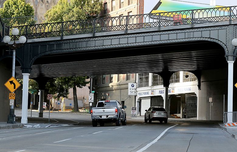 Rebuilt Yesler Way bridge to reopen Tuesday after 16-month face-lift ...