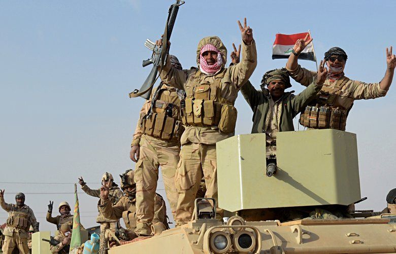 Iraqi forces retake the country’s last IS-held town | The Seattle Times