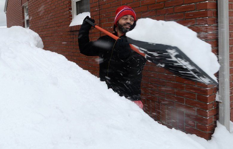 Erie smashes snowfall record with flakes still falling | The Seattle Times