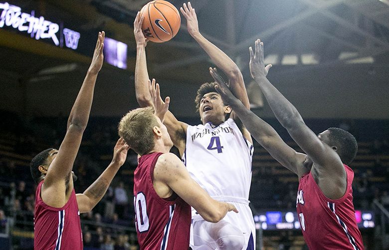 Noah Dickerson, Jaylen Nowell make sure Huskies hang on against Loyola ...