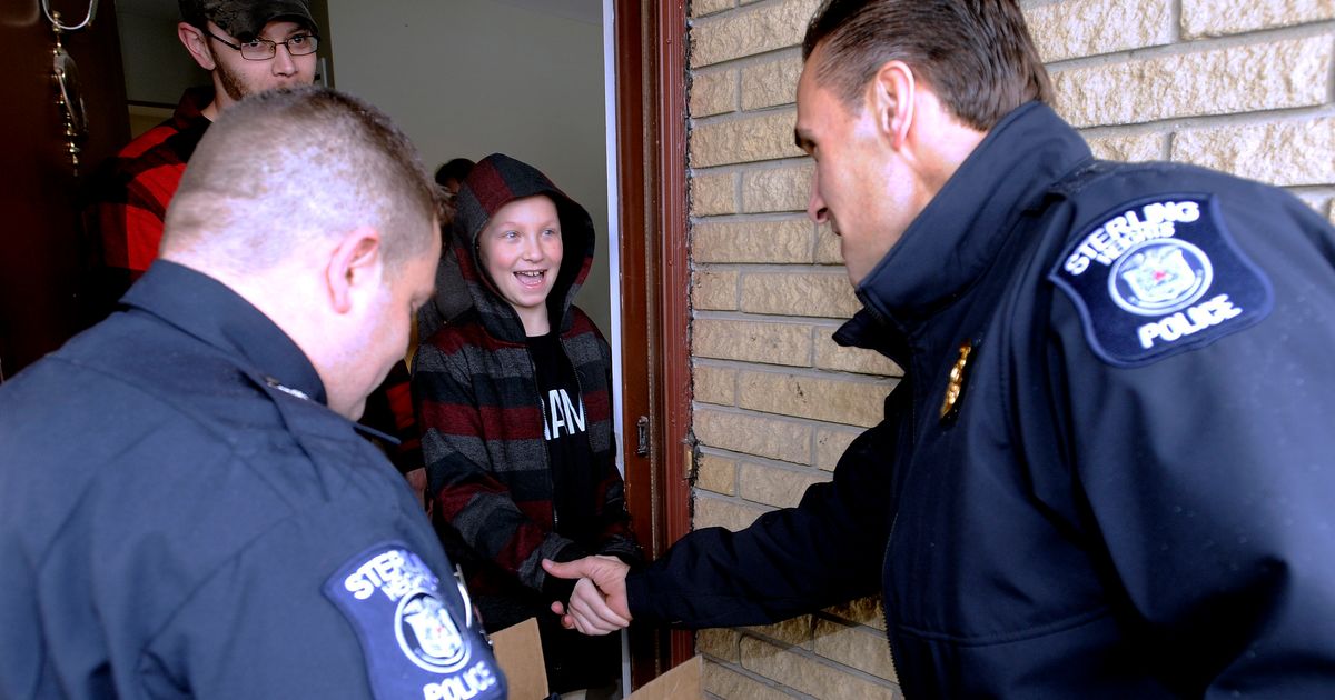 Michigan first-responders visit boy with terminal cancer | The Seattle ...