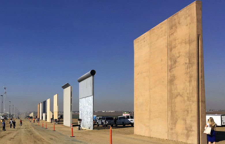 Border wall tests find heights should keep out crossers | The Seattle Times