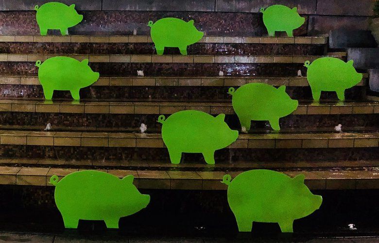 Seattle not amused by green-pigs stunt by real-estate company | The ...