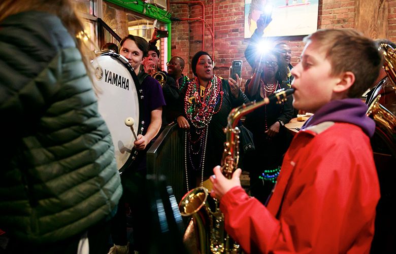 Seattle strikes up the band for Fat Tuesday | The Seattle Times