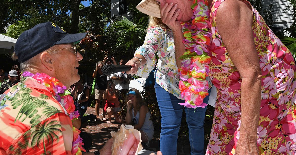 Woman wins Keys conch-blowing contest; accepts proposal | The Seattle Times