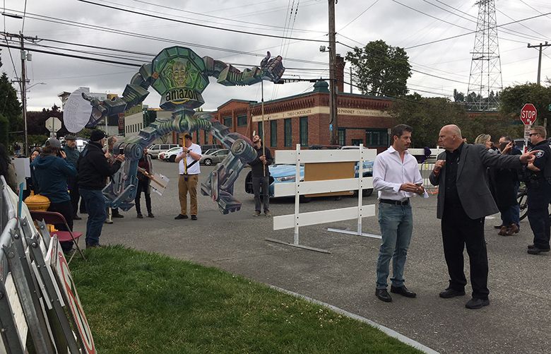 Amazon draws praise, protests at annual shareholders meeting | The ...