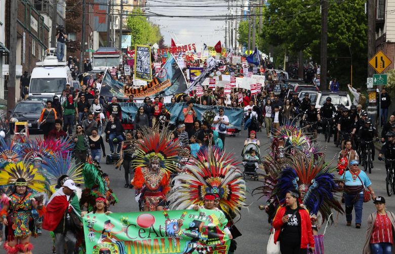 May Day marked by peaceful marches in Seattle, 1 arrest near Amazon ...