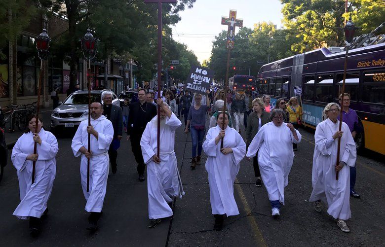 Hundreds march in Seattle to protest separation of immigrant families ...