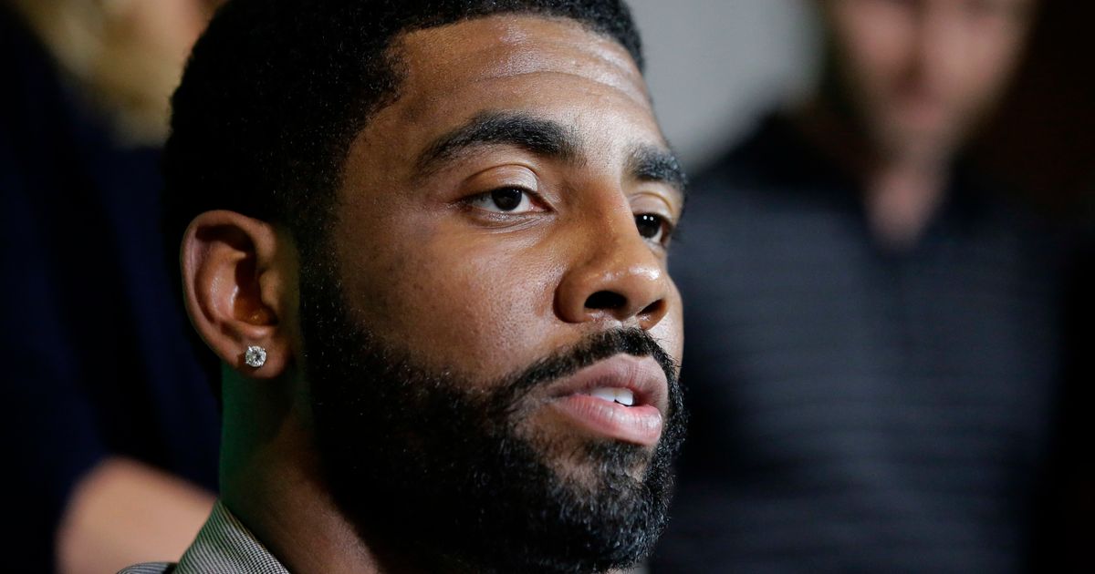 Irving stays busy with knee to mend, movie to promote | The Seattle Times