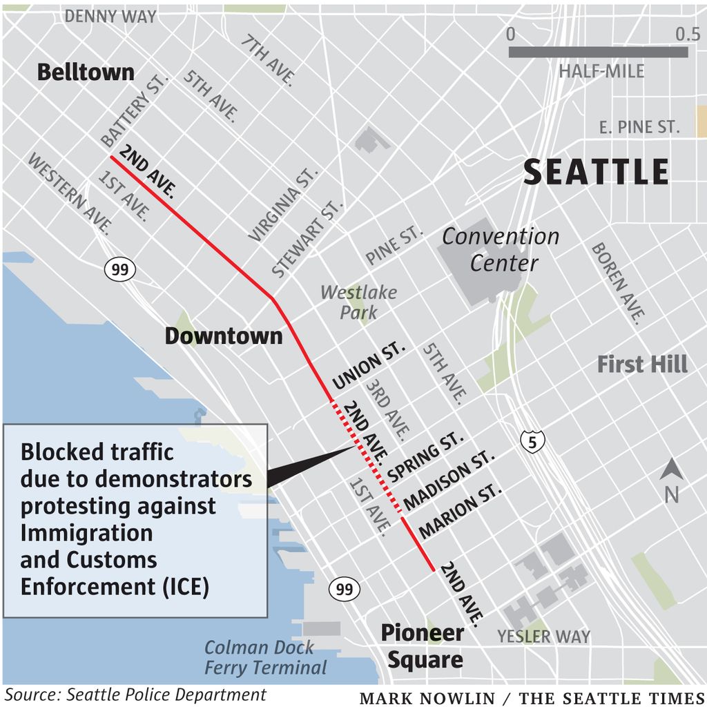 Immigrant-rights activists taken into custody for blocking Second ...
