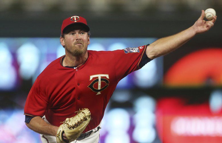 Mariners add recently-acquired reliever Zach Duke to their active ...