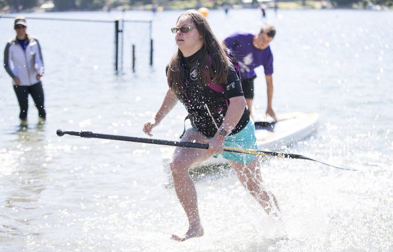 Even without water shoes, Seattle paddle boarder Devon Adelman wins ...