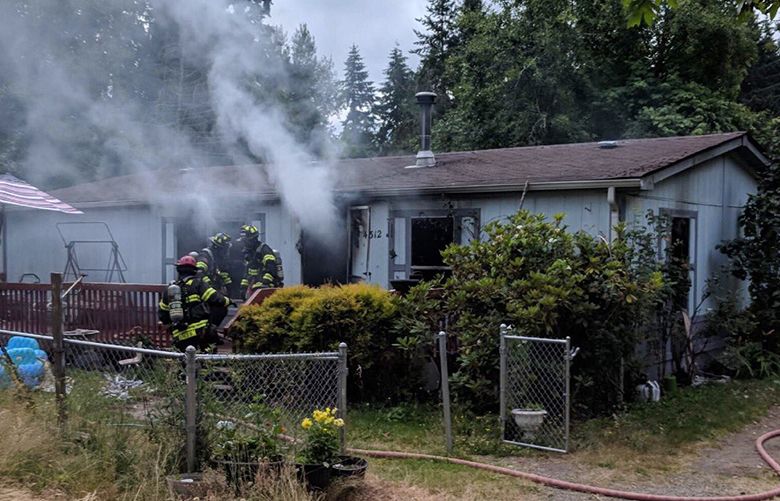 Girl, 11, critically hurt in Graham house fire | The Seattle Times