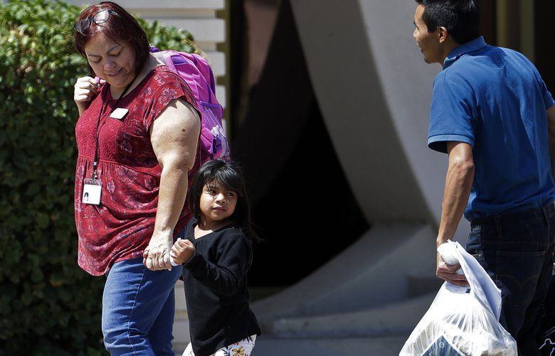 US, ACLU divide on how to reunify separated families | The Seattle Times