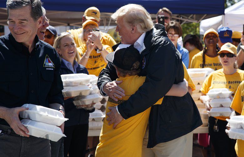 Trump comforts storm-ravaged Carolinas with hot dogs, hugs | The ...