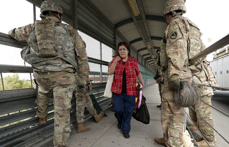 Troop deployment creates tense atmosphere on US border | The Seattle Times