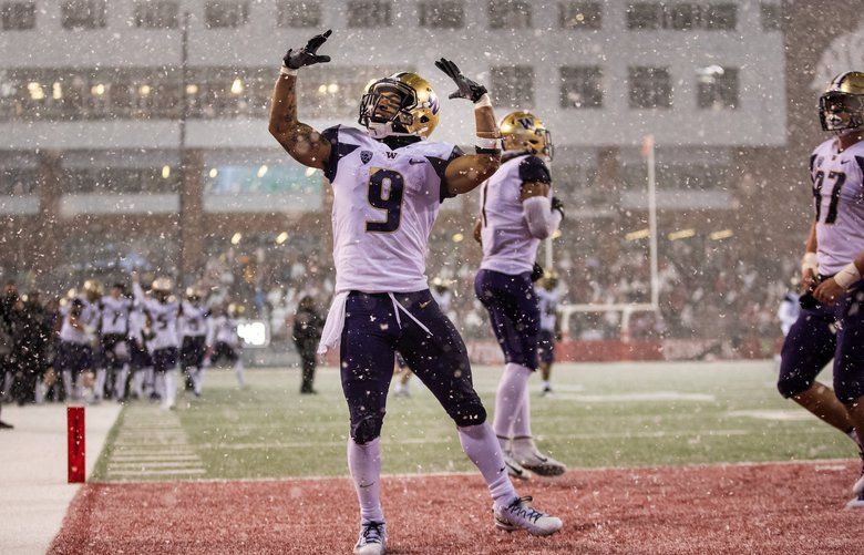 Photos: Huskies take on Cougars in 111th Apple Cup | The Seattle Times