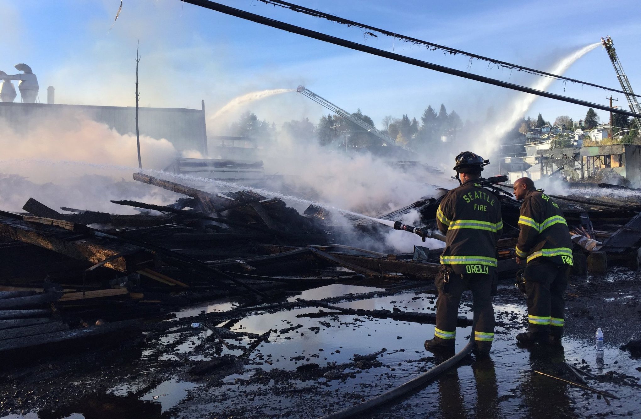 Fierce Seattle warehouse fire on Ship Canal engulfs lumberyard ...