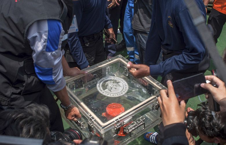 Flight recorder found after crash in Java Sea | The Seattle Times